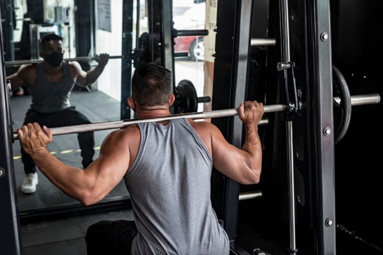 Smith Machine Leg Workout: 13 Best Exercises & Routine